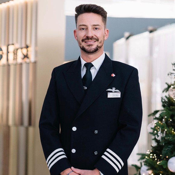 British Airways 'singing pilot' returns home to Manchester